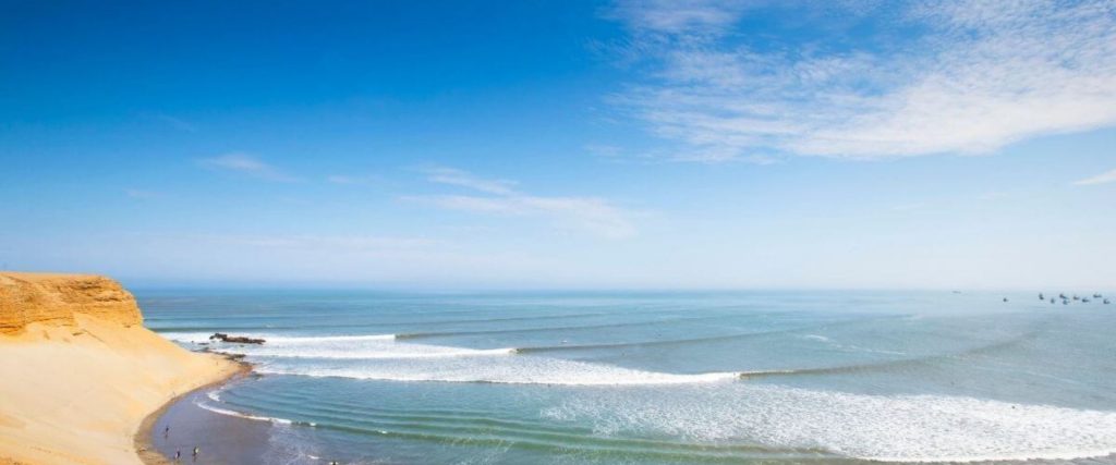 Surfing in Chicama, Peru