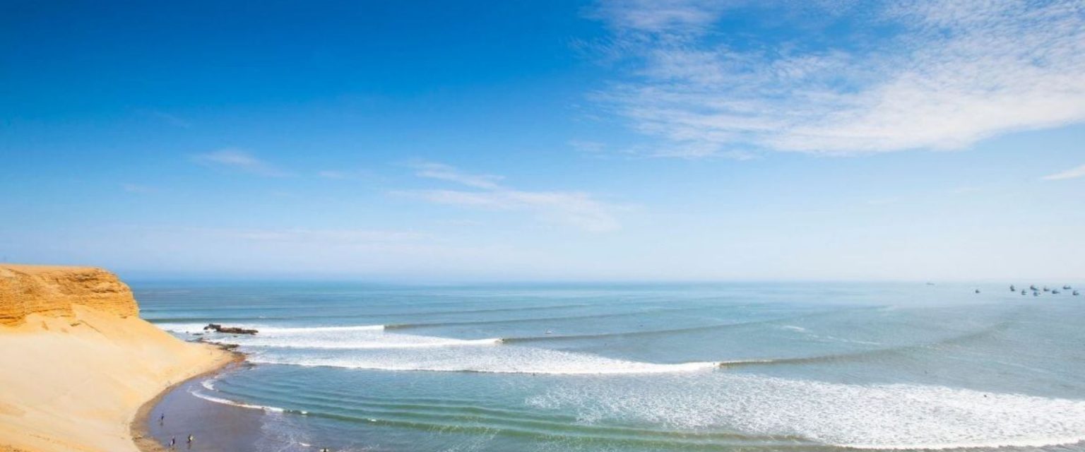 Surfing in Chicama, Peru